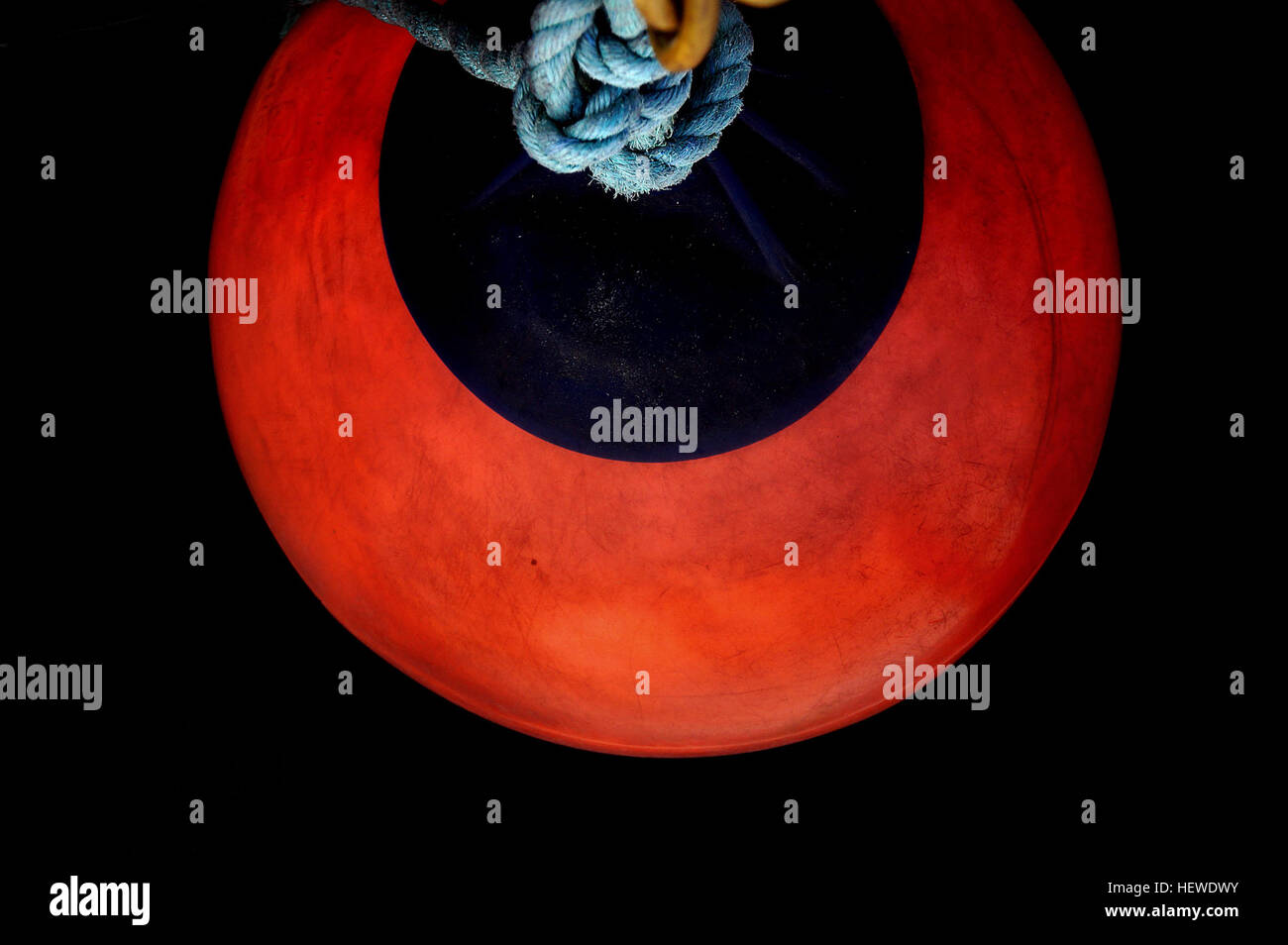 A buoyant red float is commonly used in water safety, acting as a ...