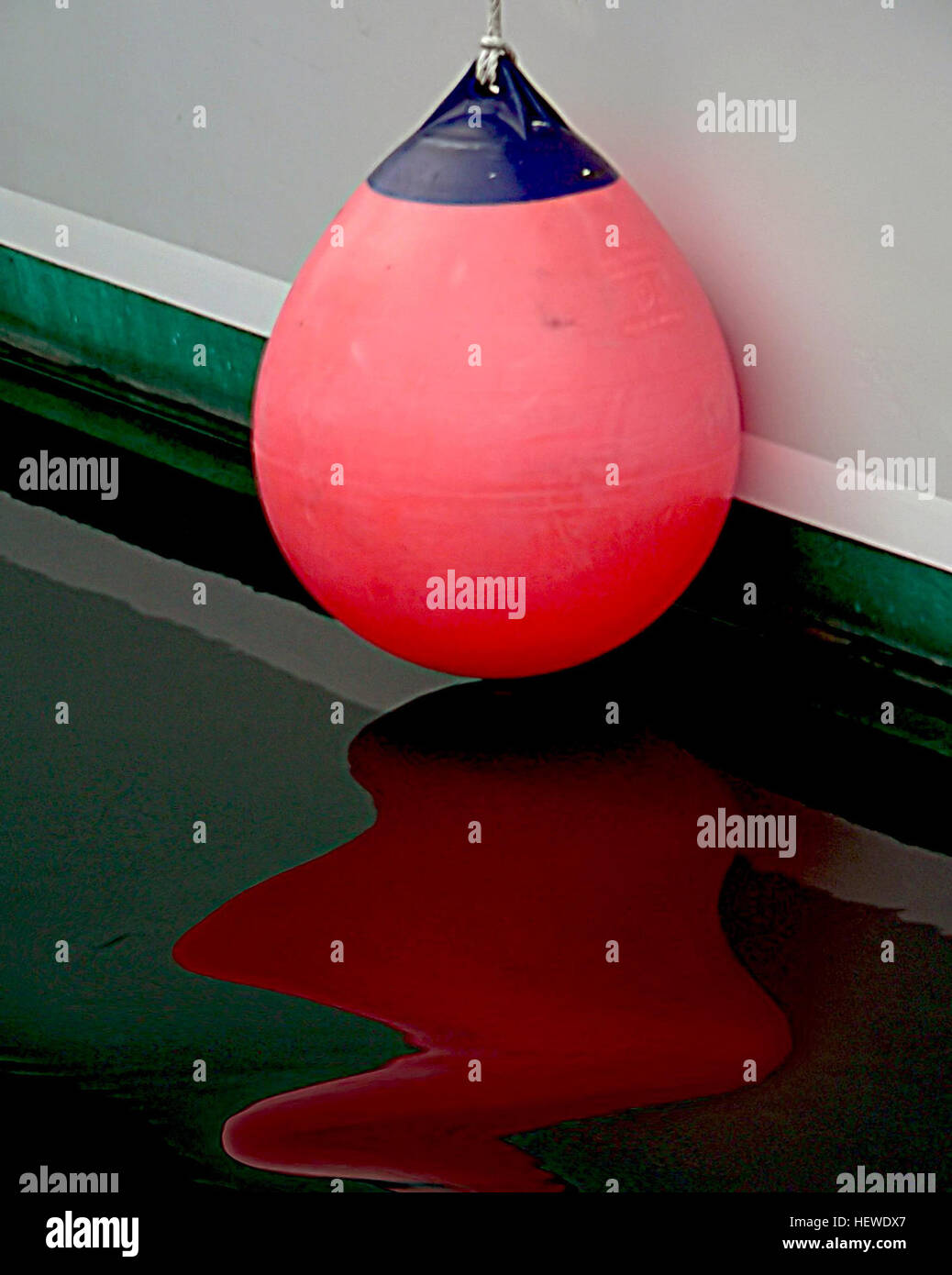 A red fishing float or buoy is an essential tool in marking fishing ...