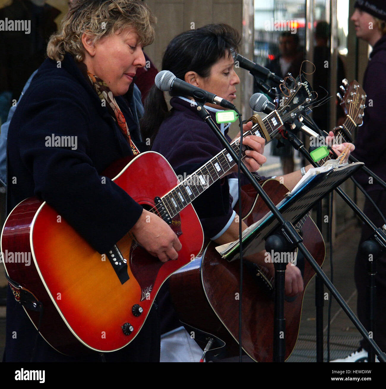 Street performance, or busking, is the practice of performing in public ...