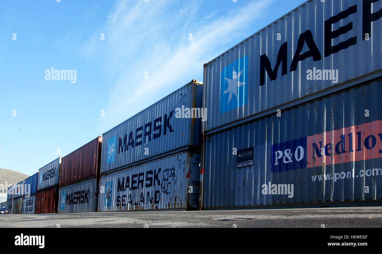 A photograph of shipping containers stacked together, highlighting ...