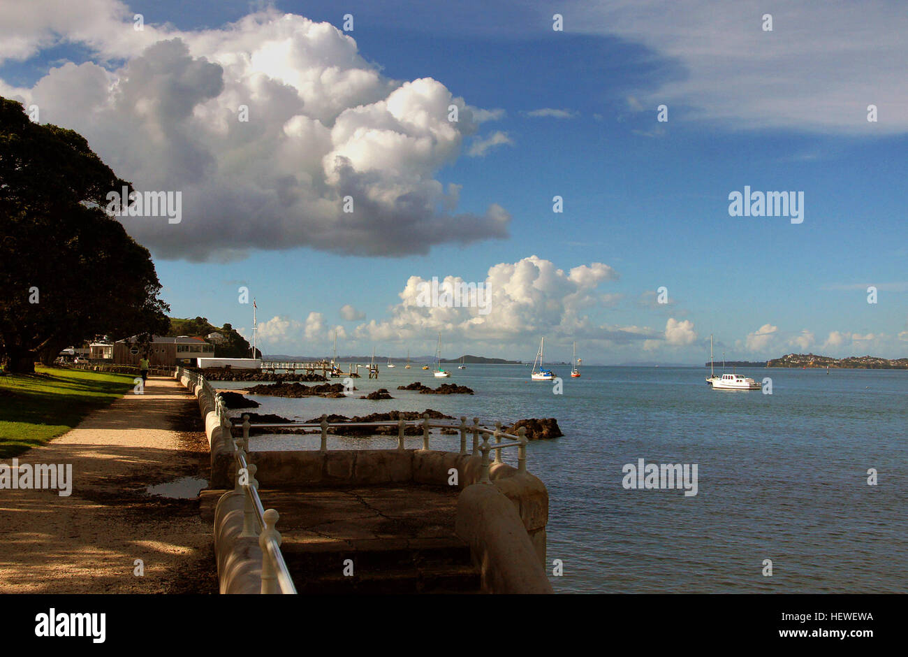 A cloudy day at Auckland Harbour offers a view of Devonport’s sandy ...