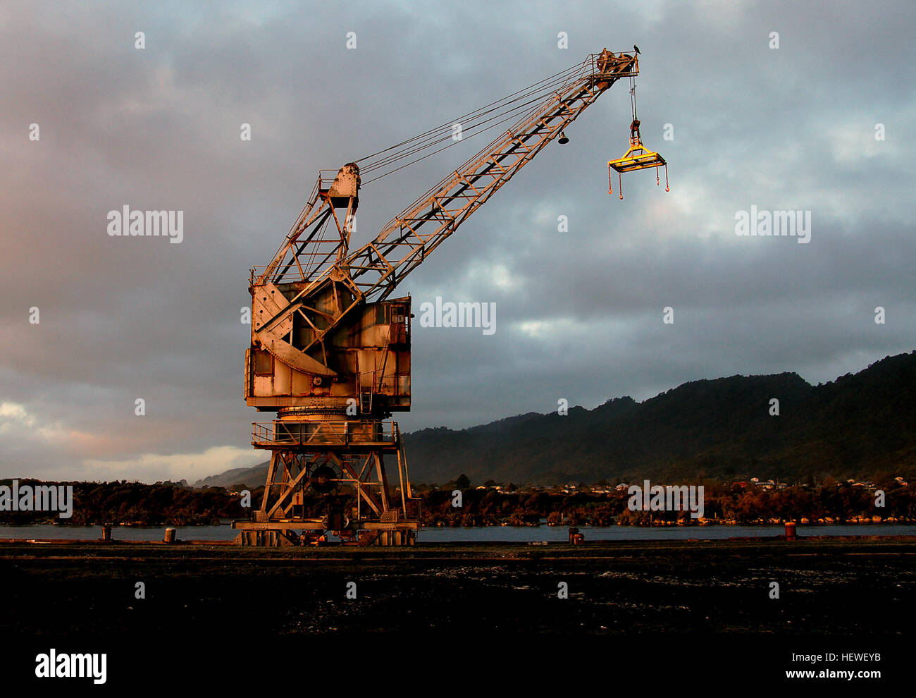 A crane is a machine designed to lift, lower, and move heavy materials ...