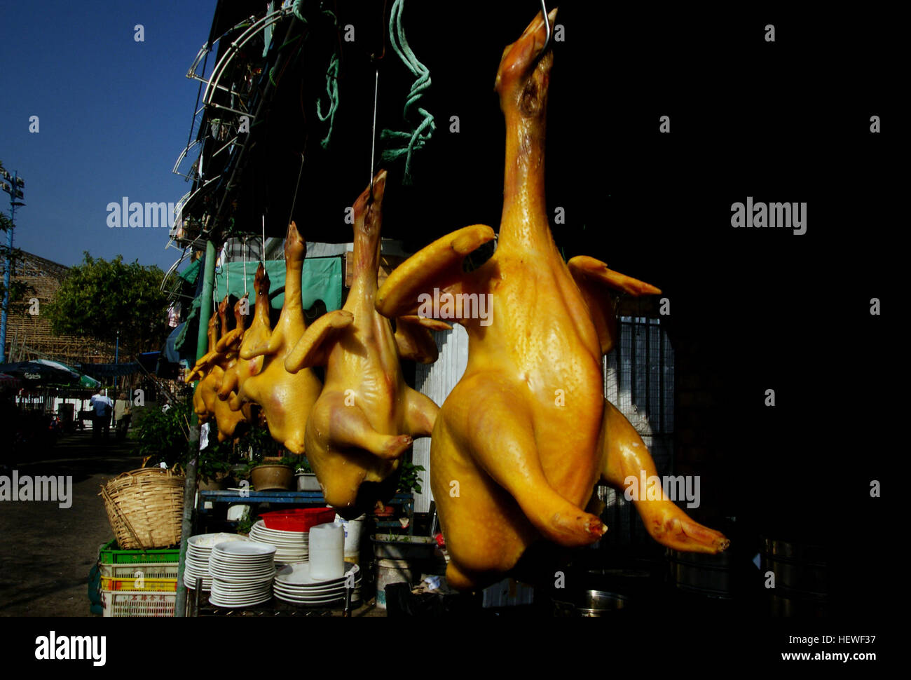 In Hong Kong, the streets feature many windows filled with hanging ...