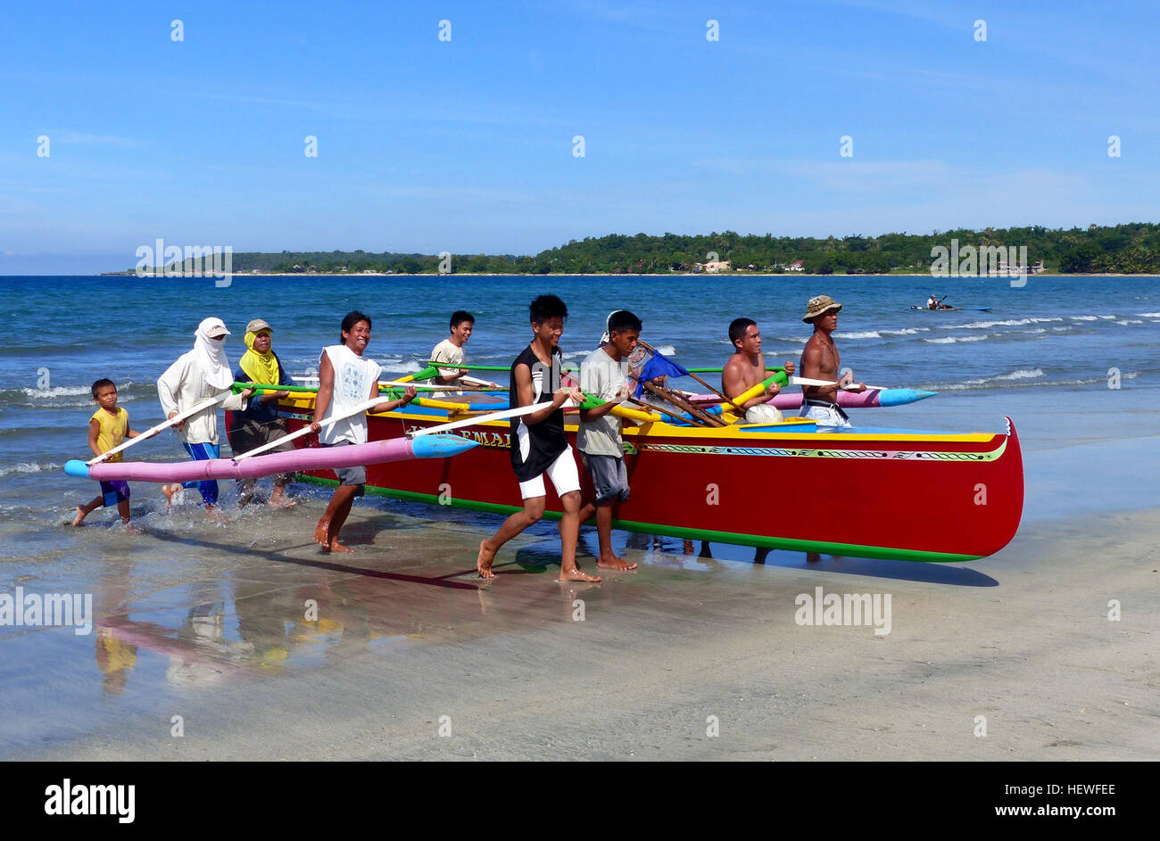 Traditional fishermen at Currimao Beach in Ilocos Norte, Philippines ...