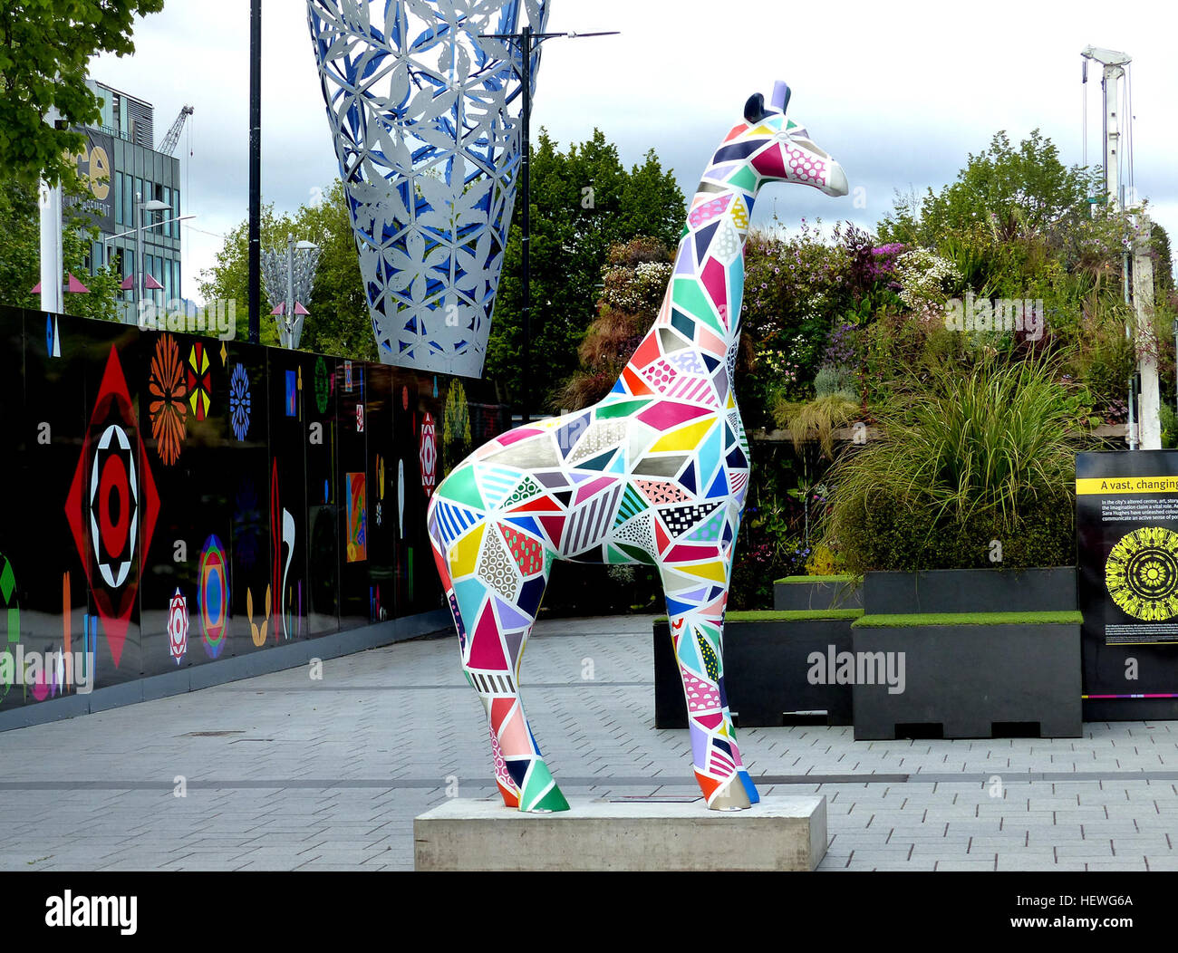 Fifty giraffe sculptures, each 2.5 meters tall, are displayed ...