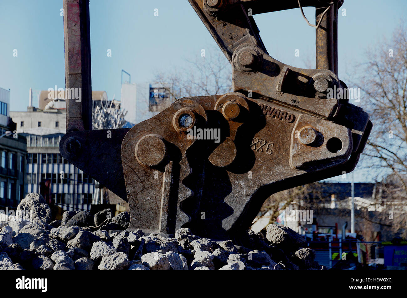 A digger equipped with a bucket is used in construction and excavation ...