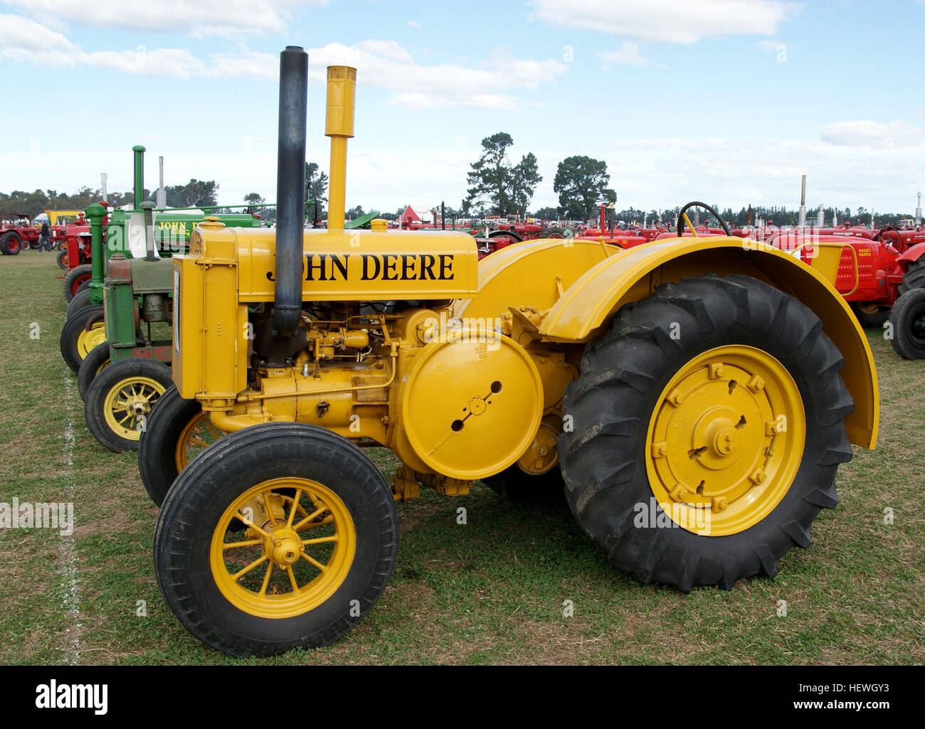 John Deere tractors and diggers are essential tools in farming, used ...