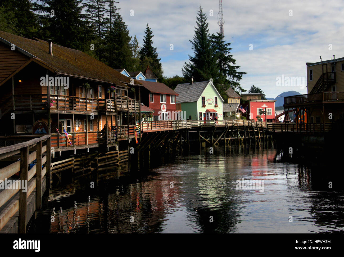 This photograph captures the fishing boats in Ketchikan, Alaska, with ...