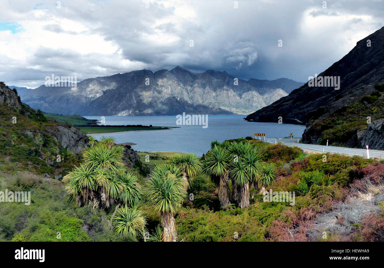 Lake Hawea, a long narrow, glacial lake, is the smallest and most ...