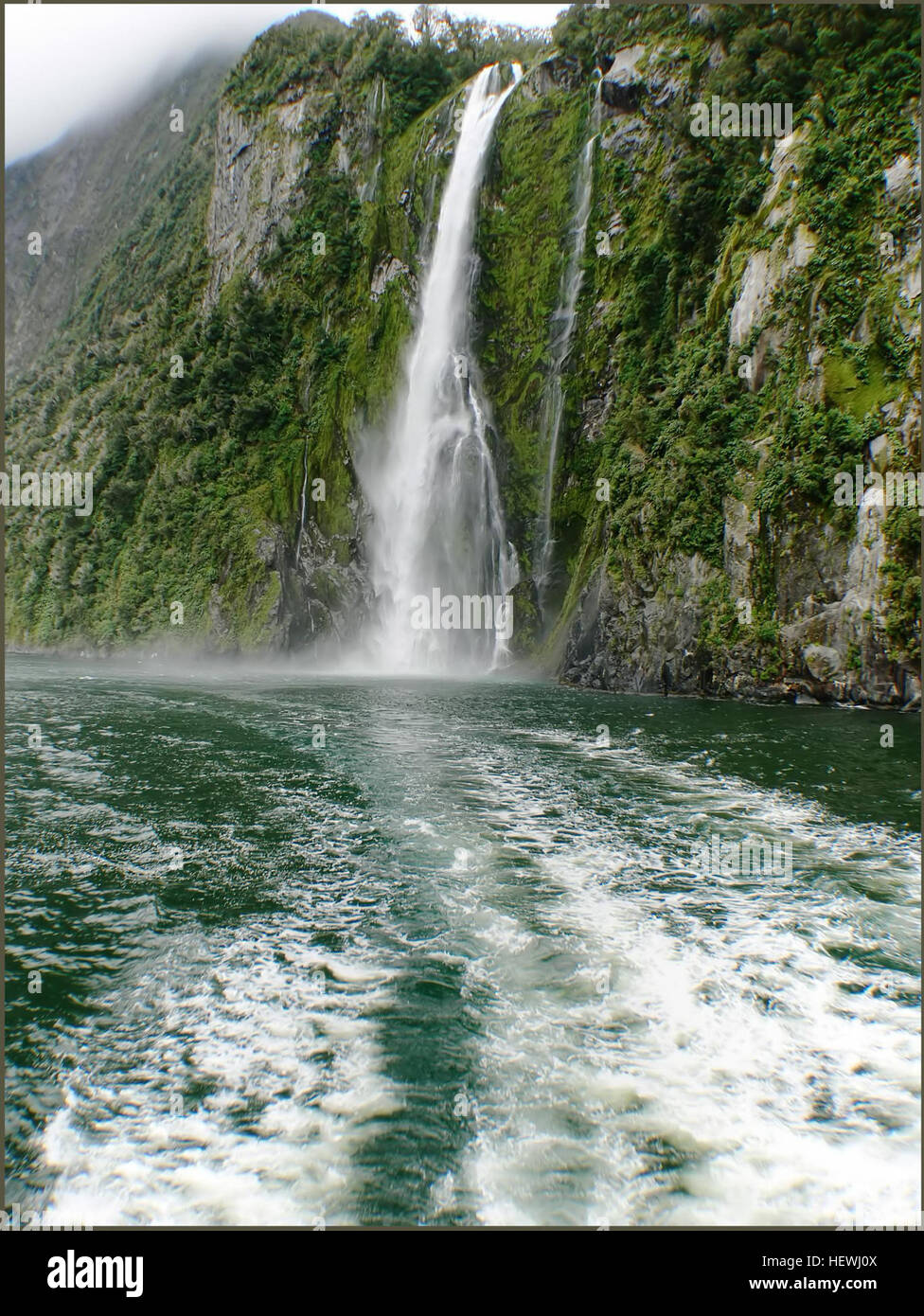 Milford Sound, located in Fiordland National Park, New Zealand, is a ...