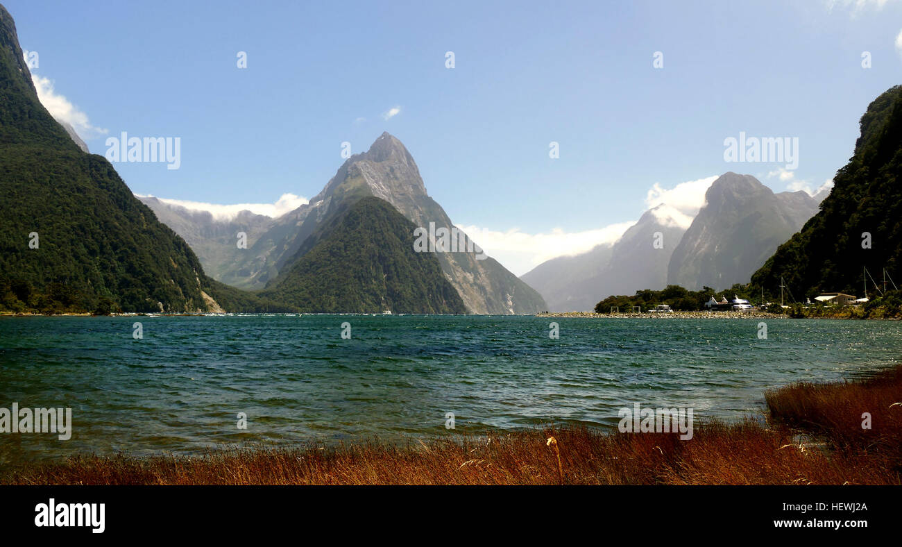 Milford Sound in New Zealand is a dramatic fiord surrounded by steep ...