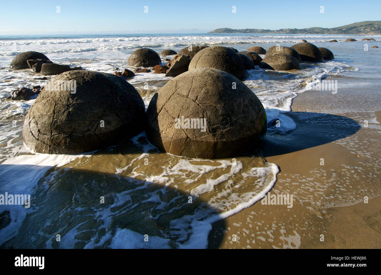 The Moeraki Boulders are large, spherical rock formations found on ...