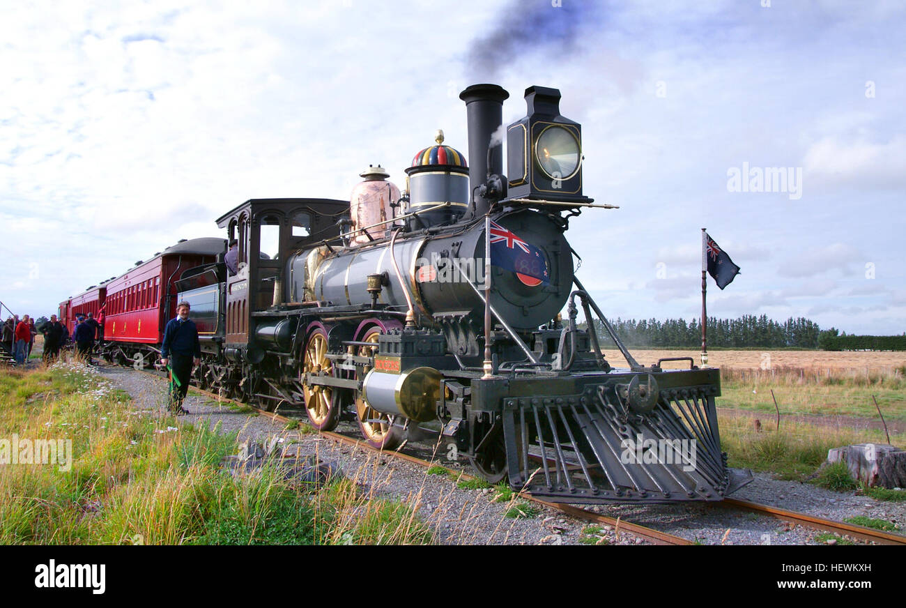 A historic photograph of an old steam train, Rogers K 88, in Ashburton ...