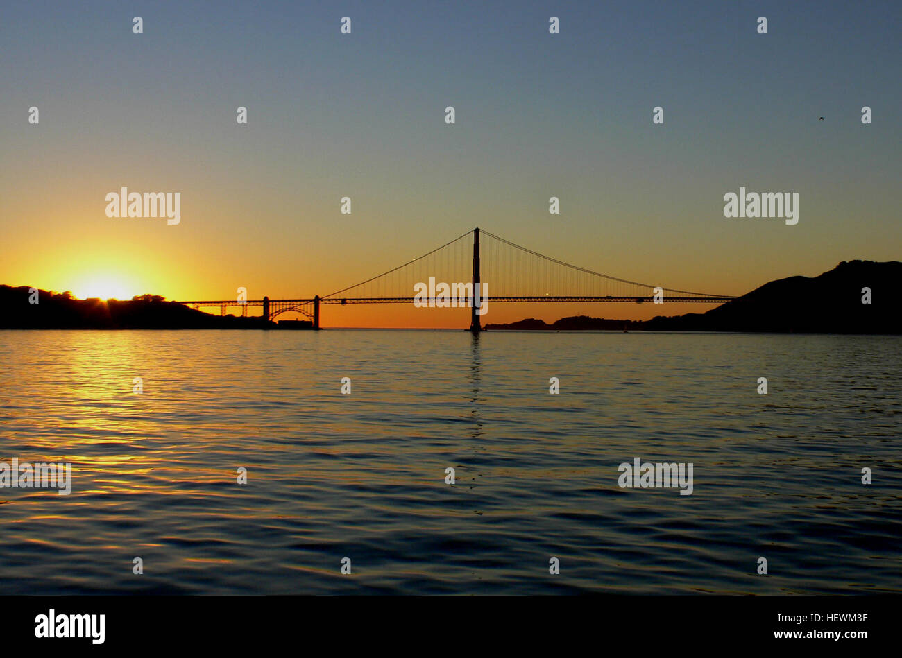A stunning view of the Golden Gate Bridge at sunset, showcasing its ...