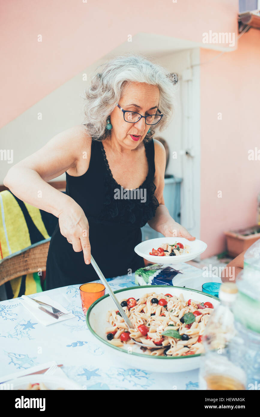 Woman eating pasta italy hi-res stock photography and images - Alamy