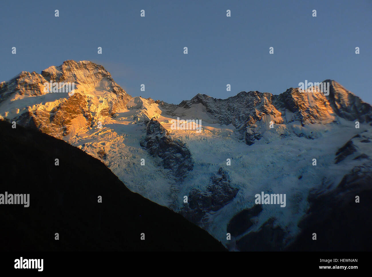 Serious glaciated mountains hi-res stock photography and images - Alamy