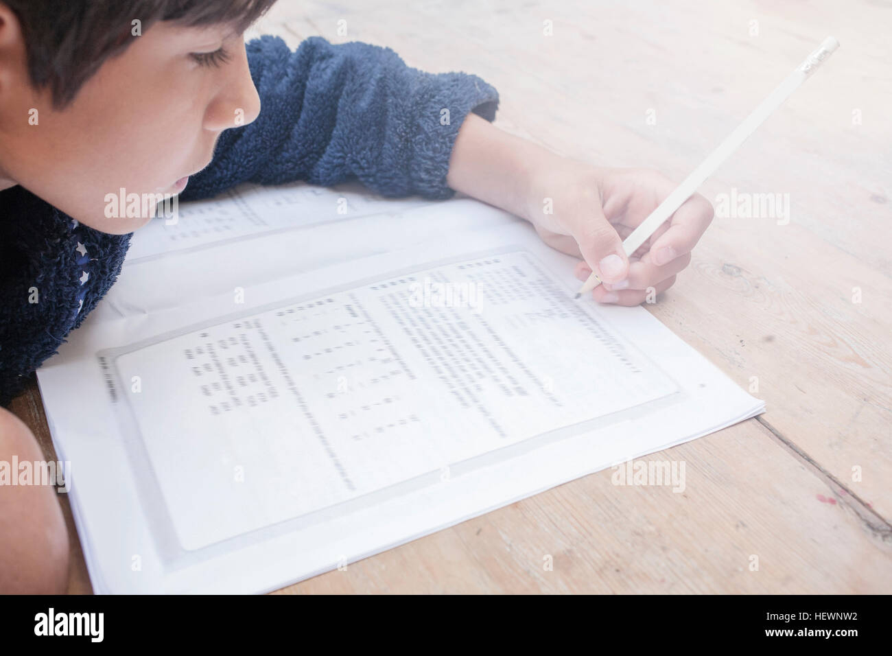Boy doing maths examination Stock Photo - Alamy