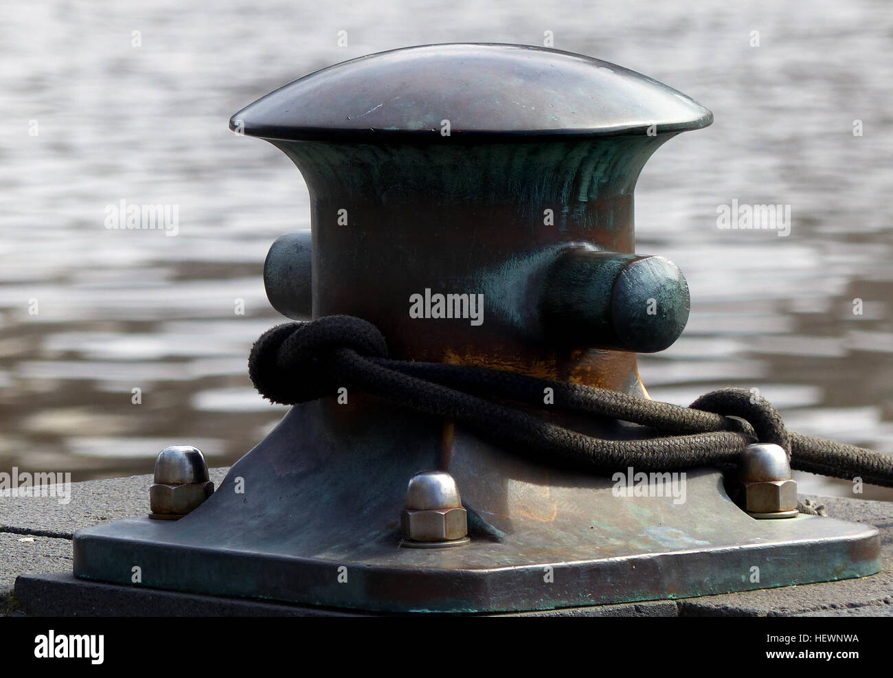 A bollard is a short, vertical post historically used for mooring ships ...
