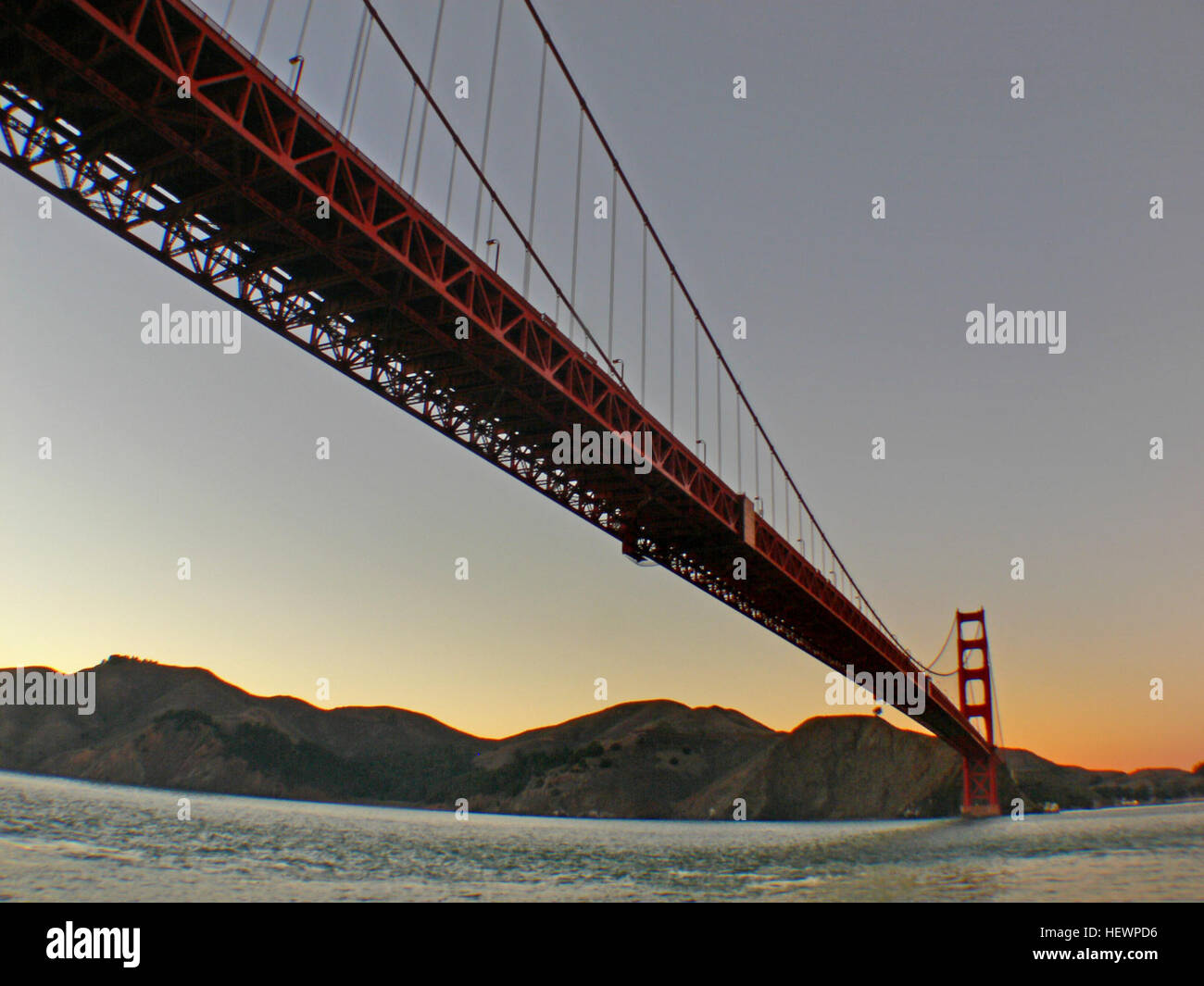 This photo captures the Golden Gate Bridge during a sunset cruise ...