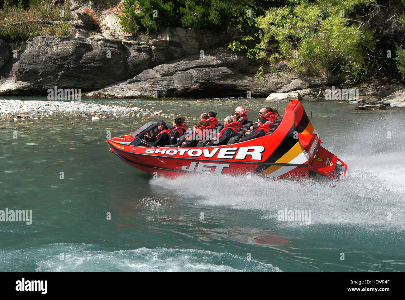This image showcases the thrilling jet boat ride along the Shotover ...