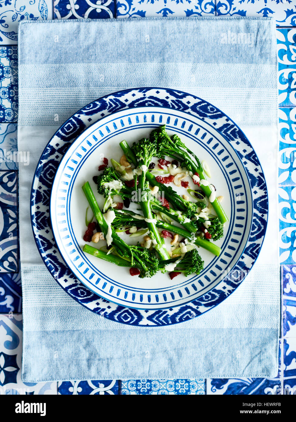 Broccoli and seeds dish Stock Photo - Alamy
