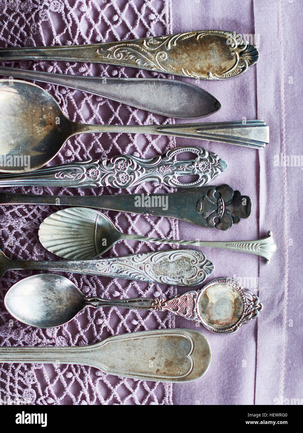 Design on antique-looking spoons and handles, close up view Stock Photo ...