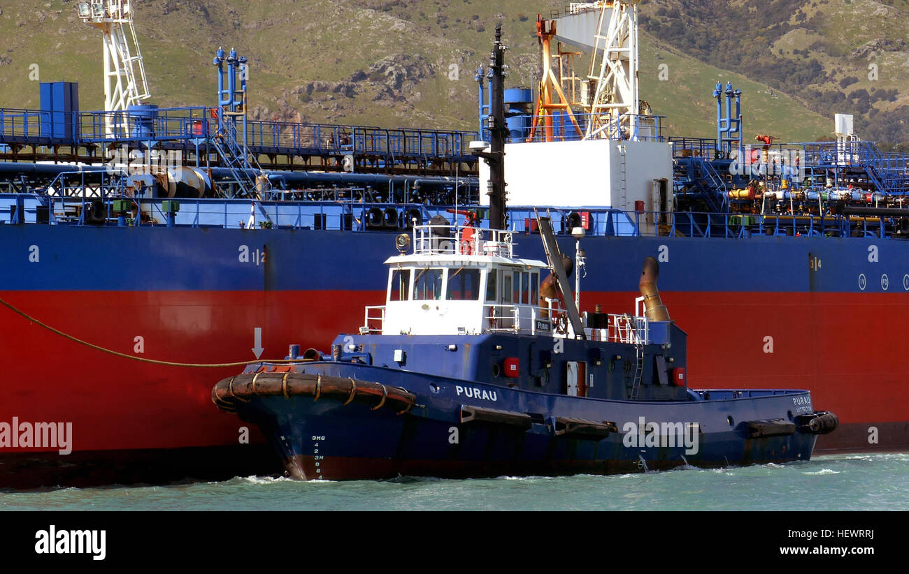 A tugboat (tug) is a boat that maneuvers vessels by pushing or towing ...