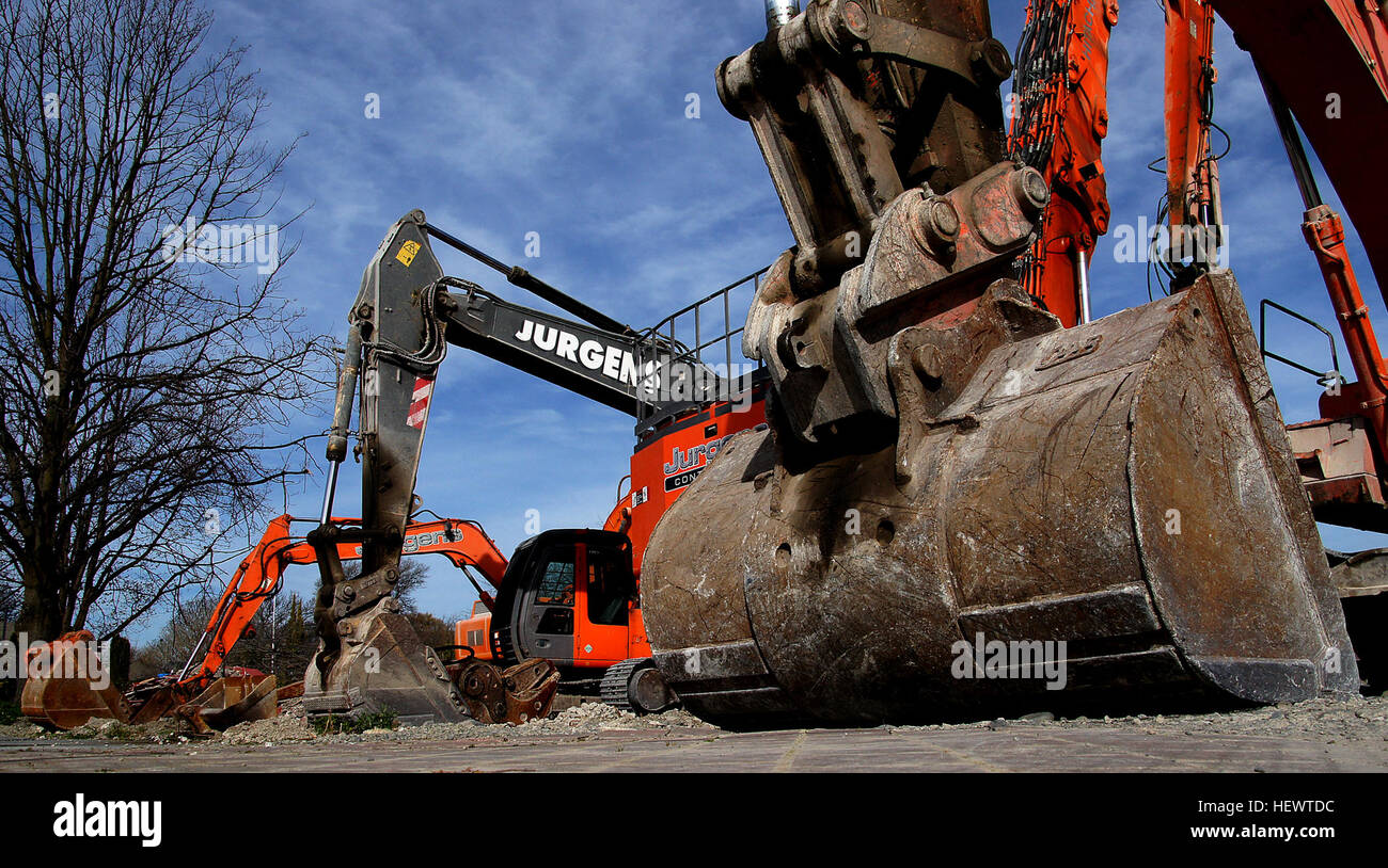 Heavy equipment includes vehicles like excavators, bulldozers, and ...