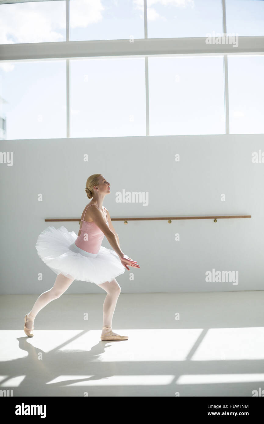 Ballerina practicing a ballet dance in ballet studio Stock Photo - Alamy