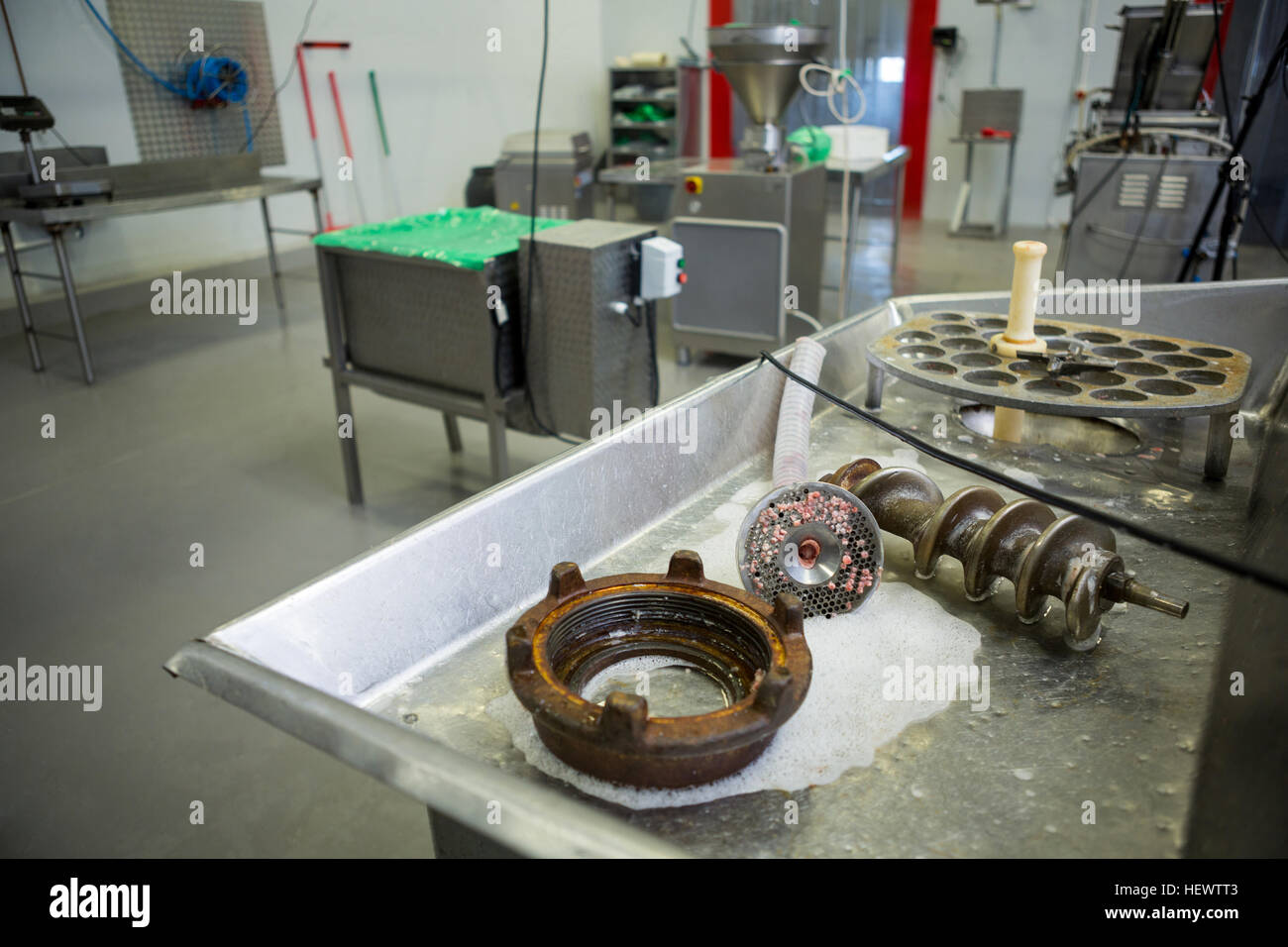 Meat processing machines at meat factory Stock Photo - Alamy