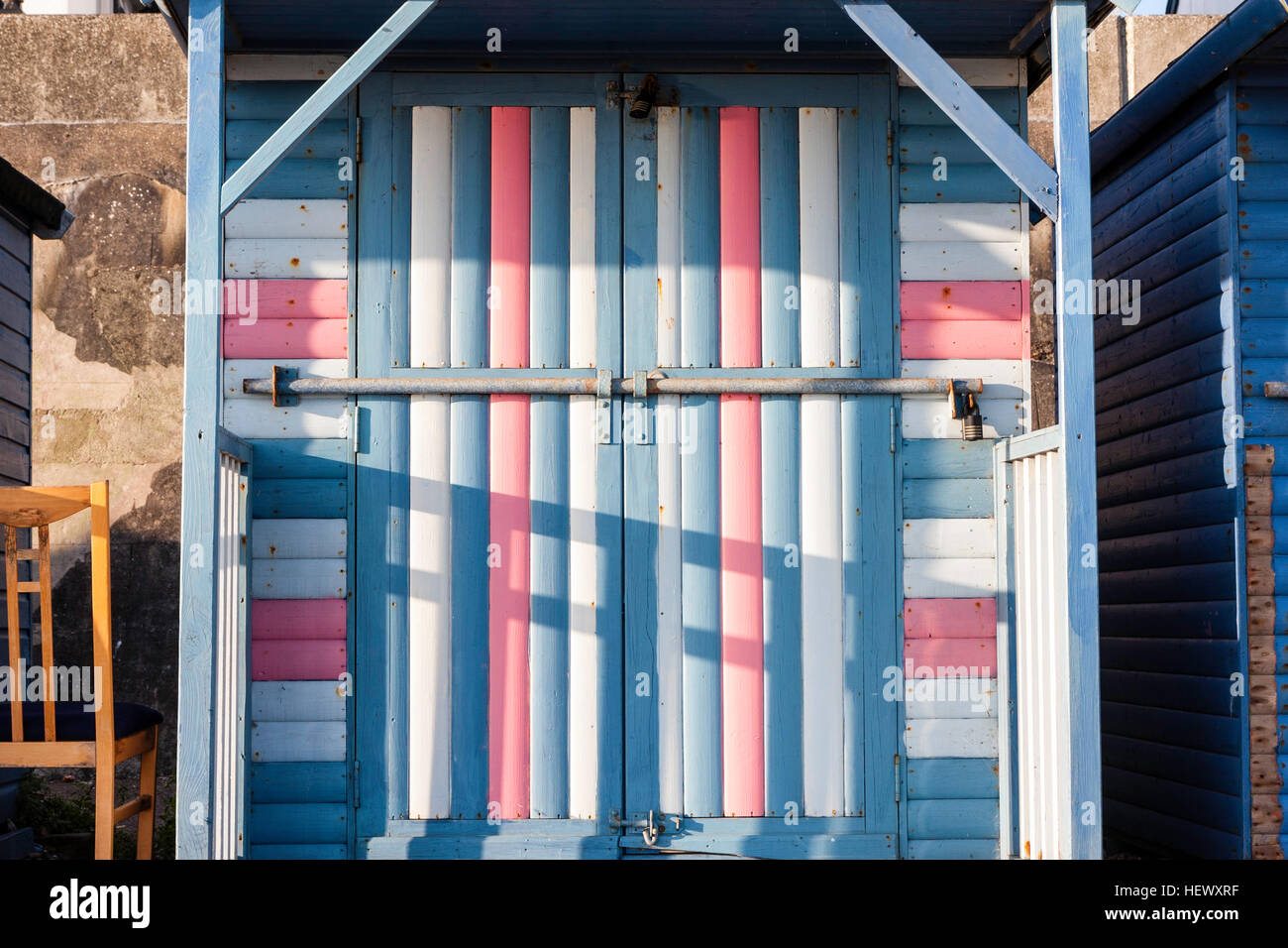 Traditional English beach hut, front view of double doors, locked ...