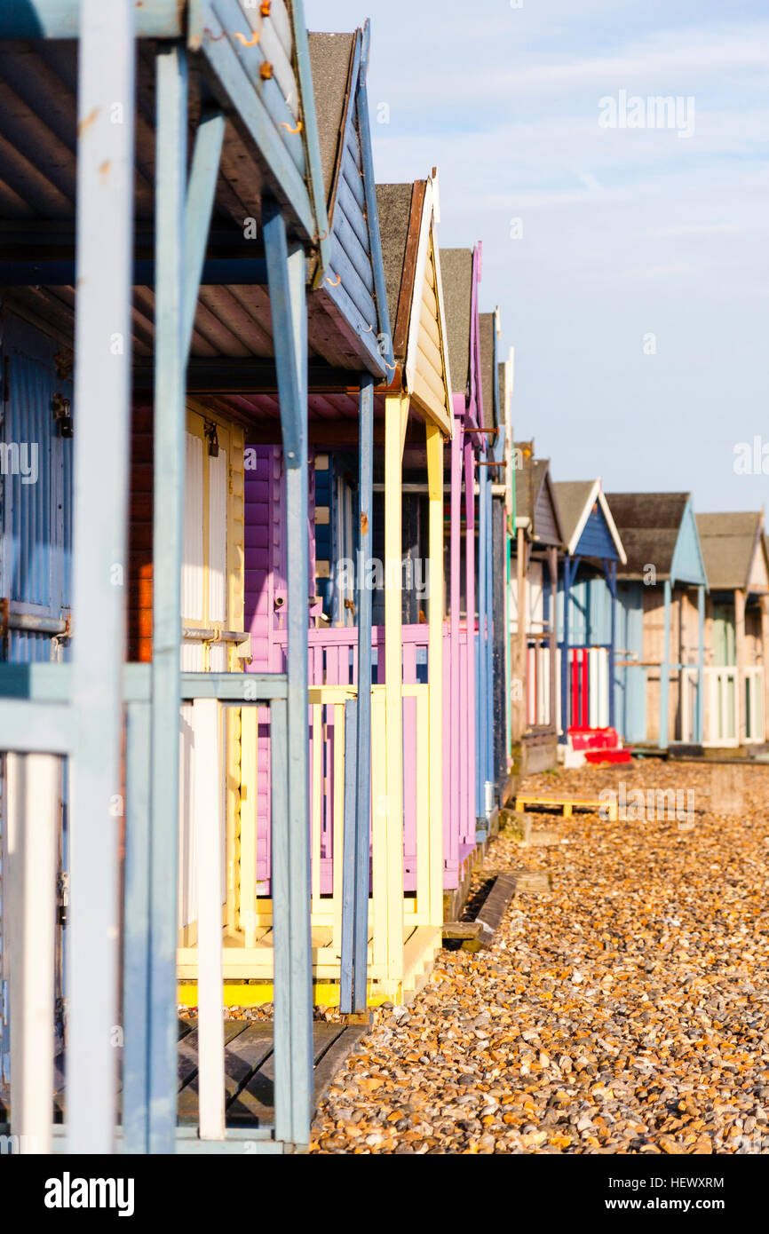View along Row of English traditional beach huts at Herne Bay on the ...