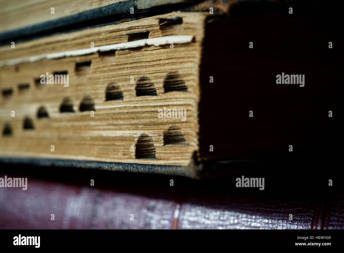 old dictionary in a stack of books Stock Photo - Alamy