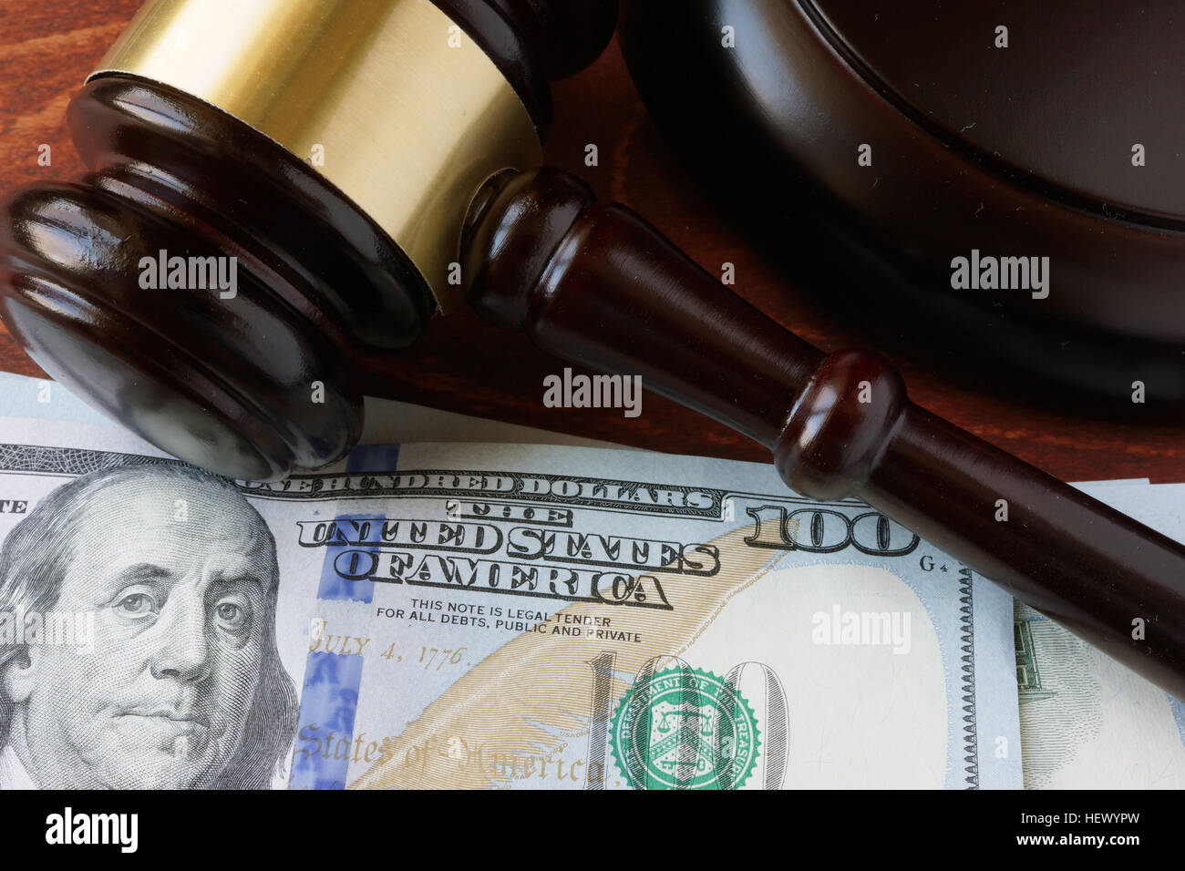 A gavel and currency on a table Stock Photo - Alamy