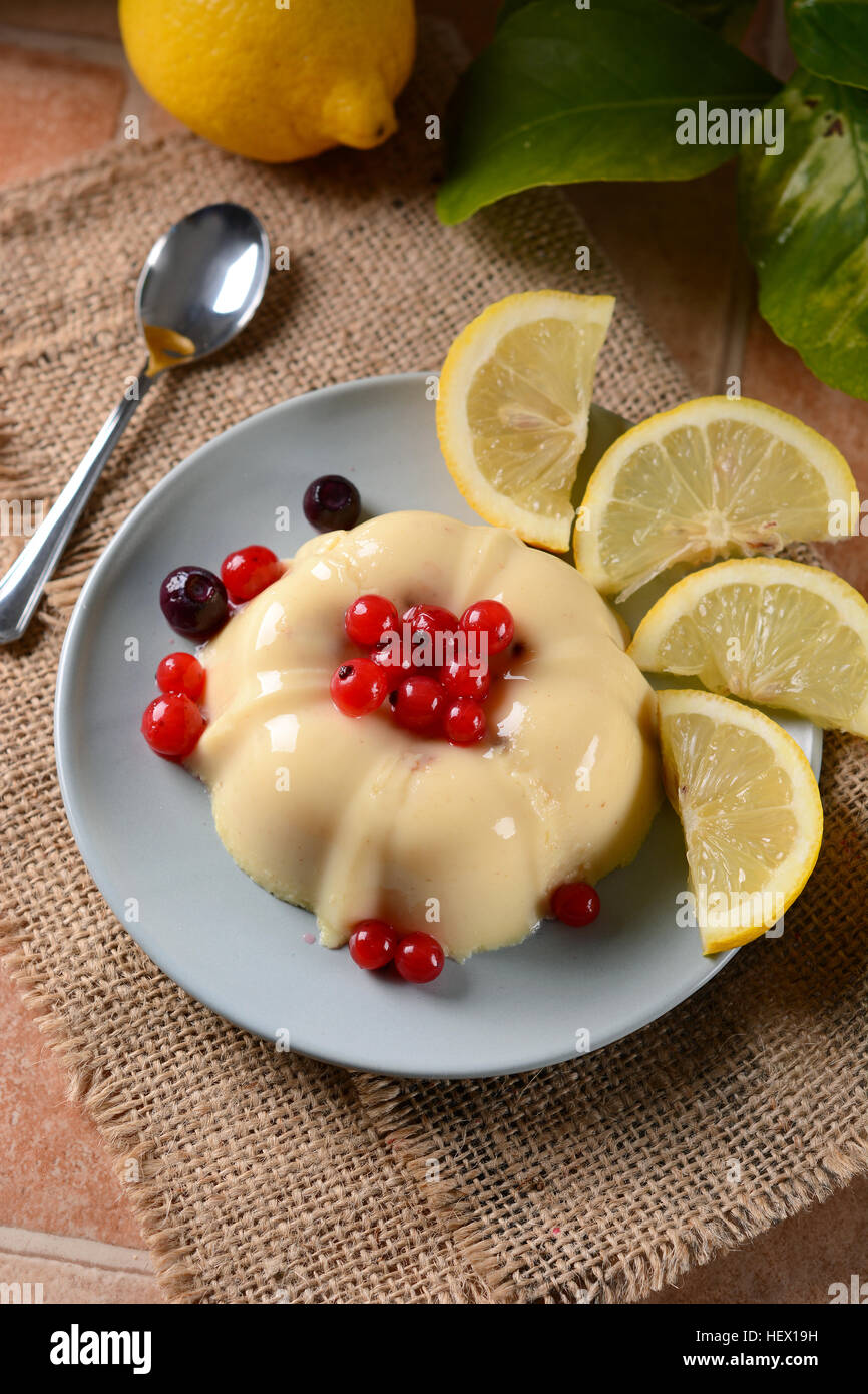 lemon pudding with currants in the saucer Stock Photo - Alamy