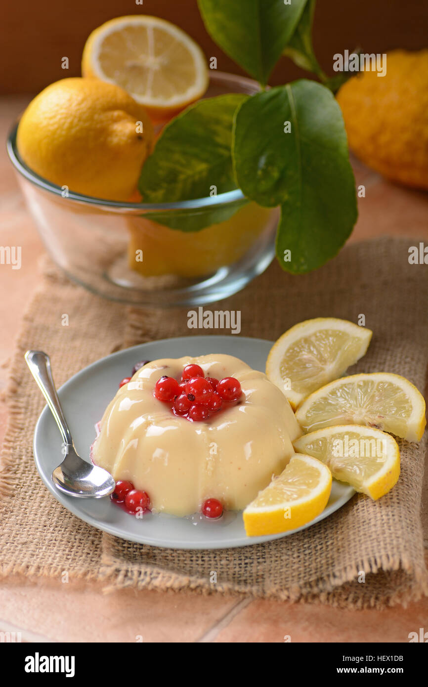 lemon pudding with currants in the saucer Stock Photo - Alamy