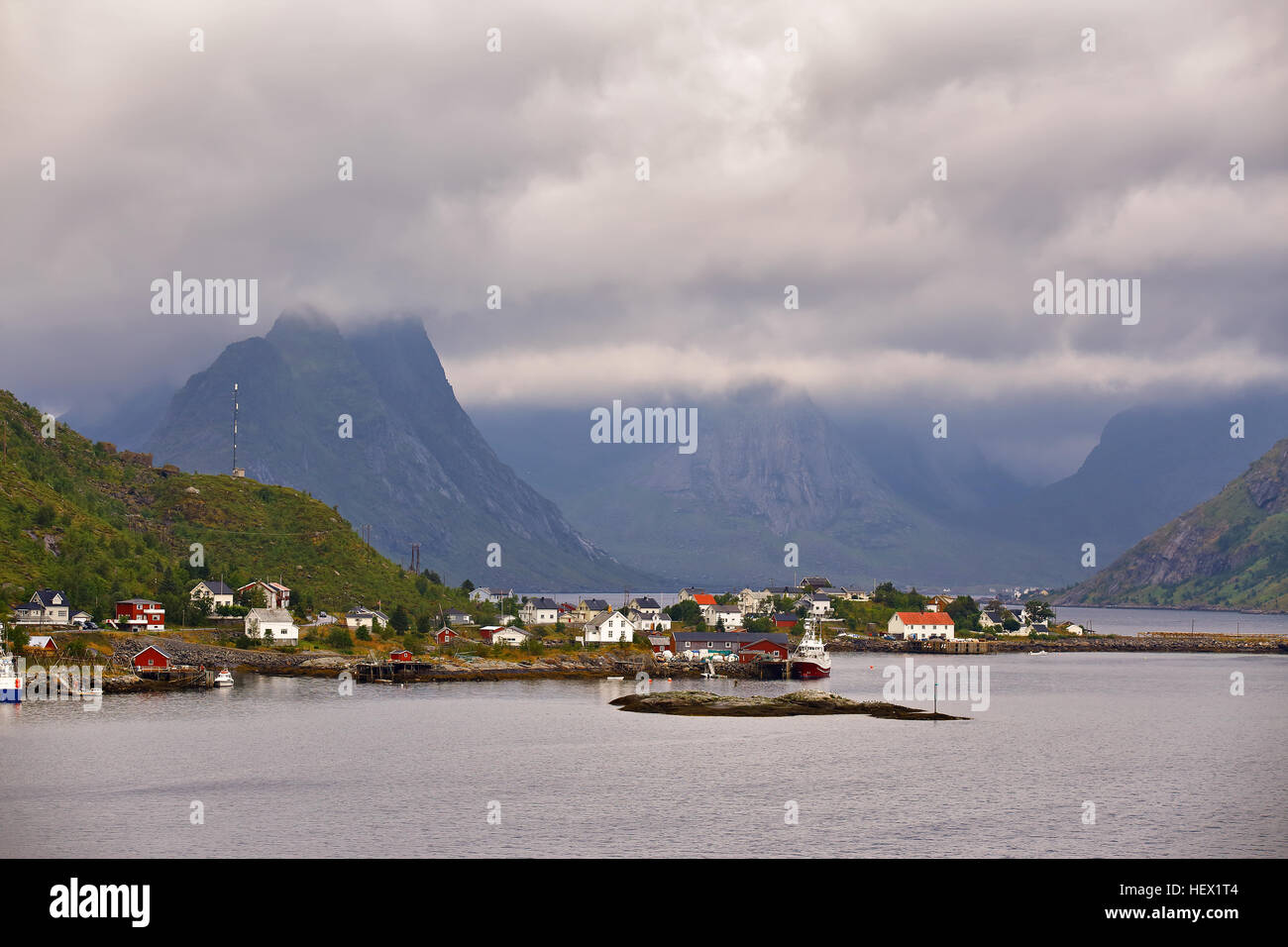 Norway village Reine on a fjord. Nordic cloudy summer day. Lofoten ...