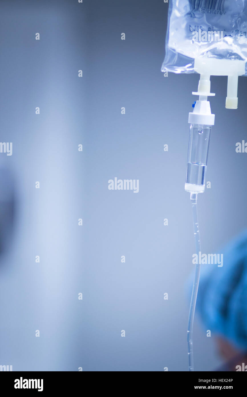 Medical intravenous IV drip in hospital used to replace liquids in ... Medical intravenous IV drip in hospital used to replace liquids in ...