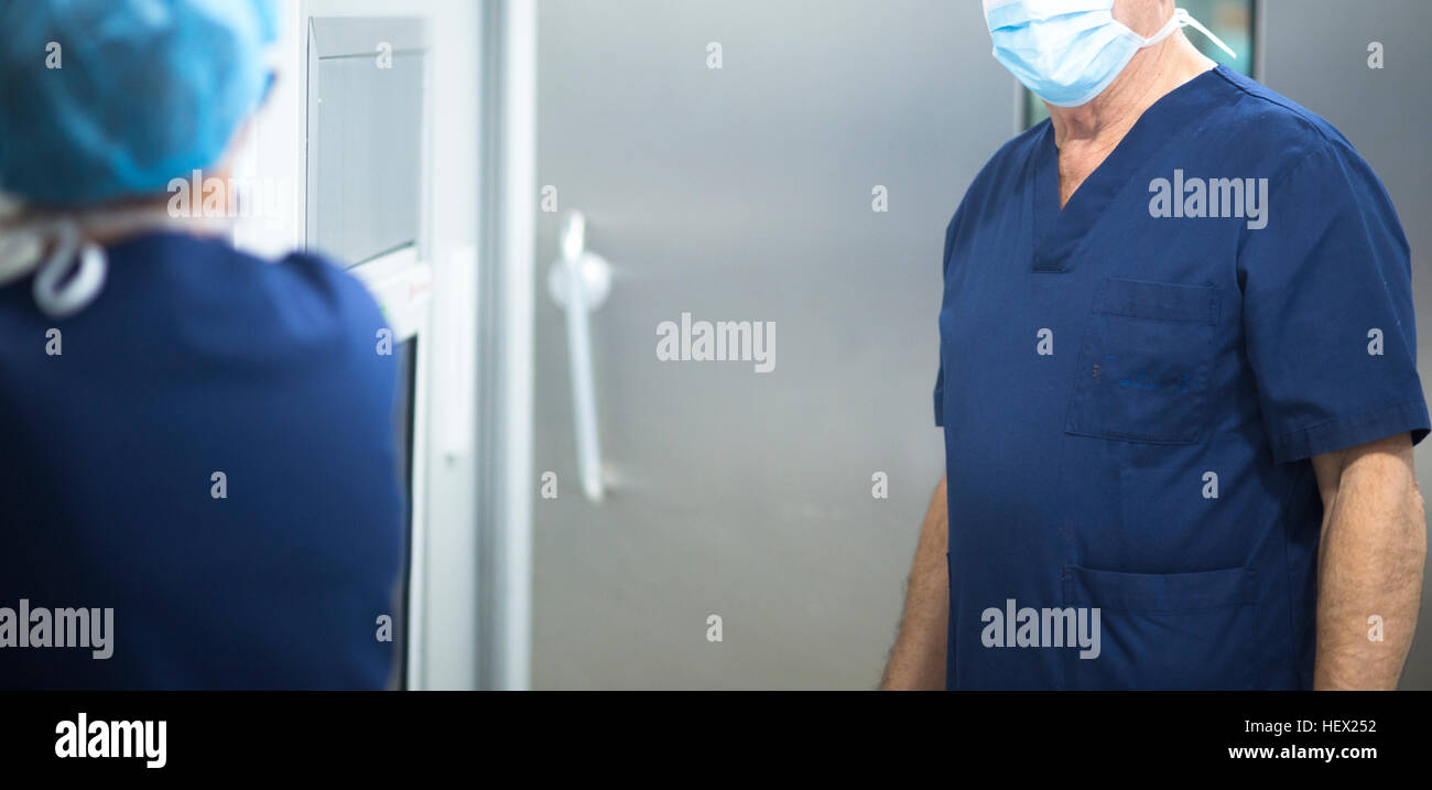 Surgeon in operating theater emergency room surgery in hospital clinic ...