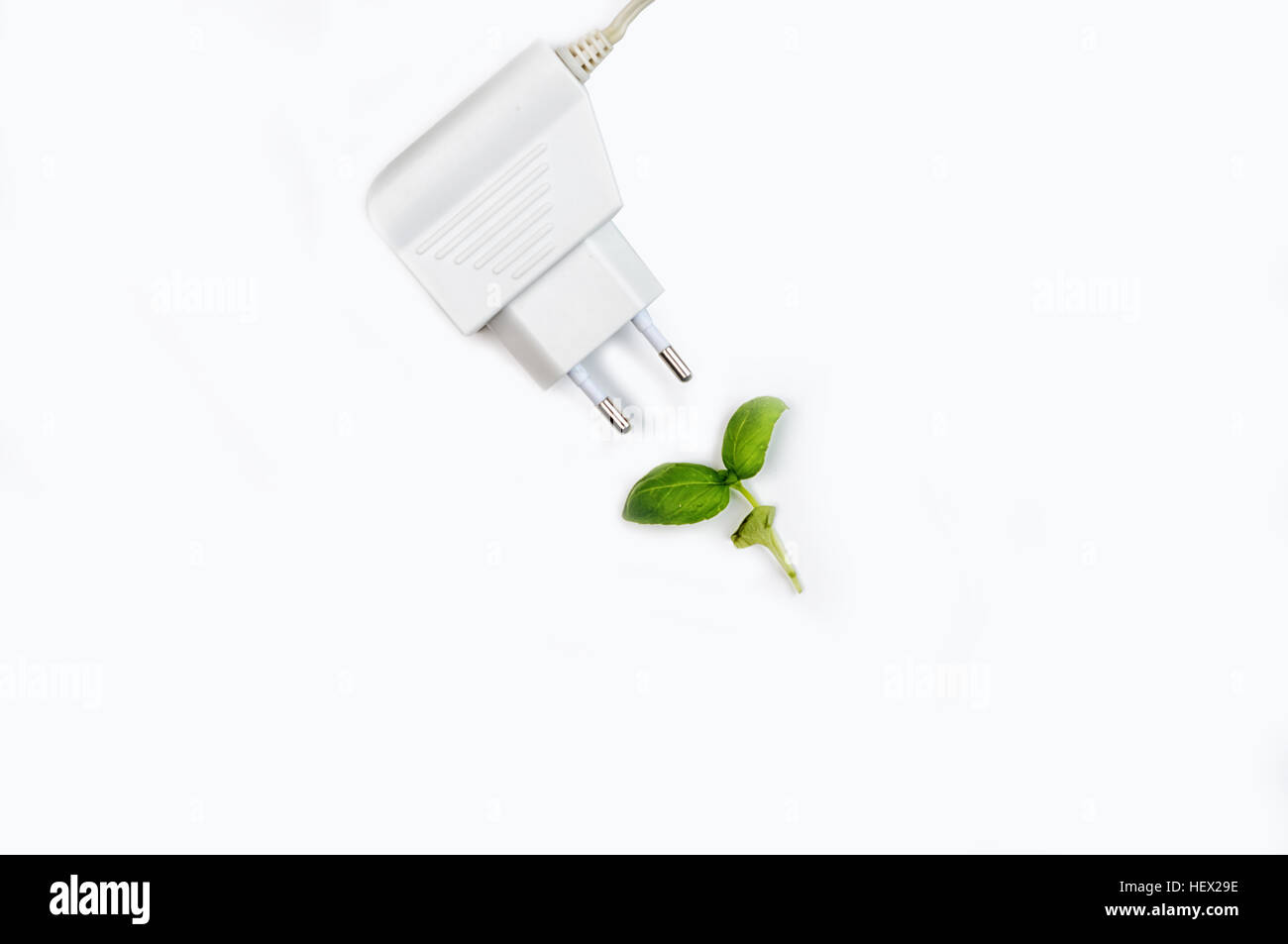 a power surge with plants growing symbolizing clean energy Stock Photo ...