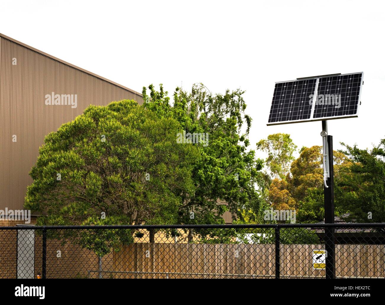 A small solar panel on an overcast day, sun, operating an automatic ...