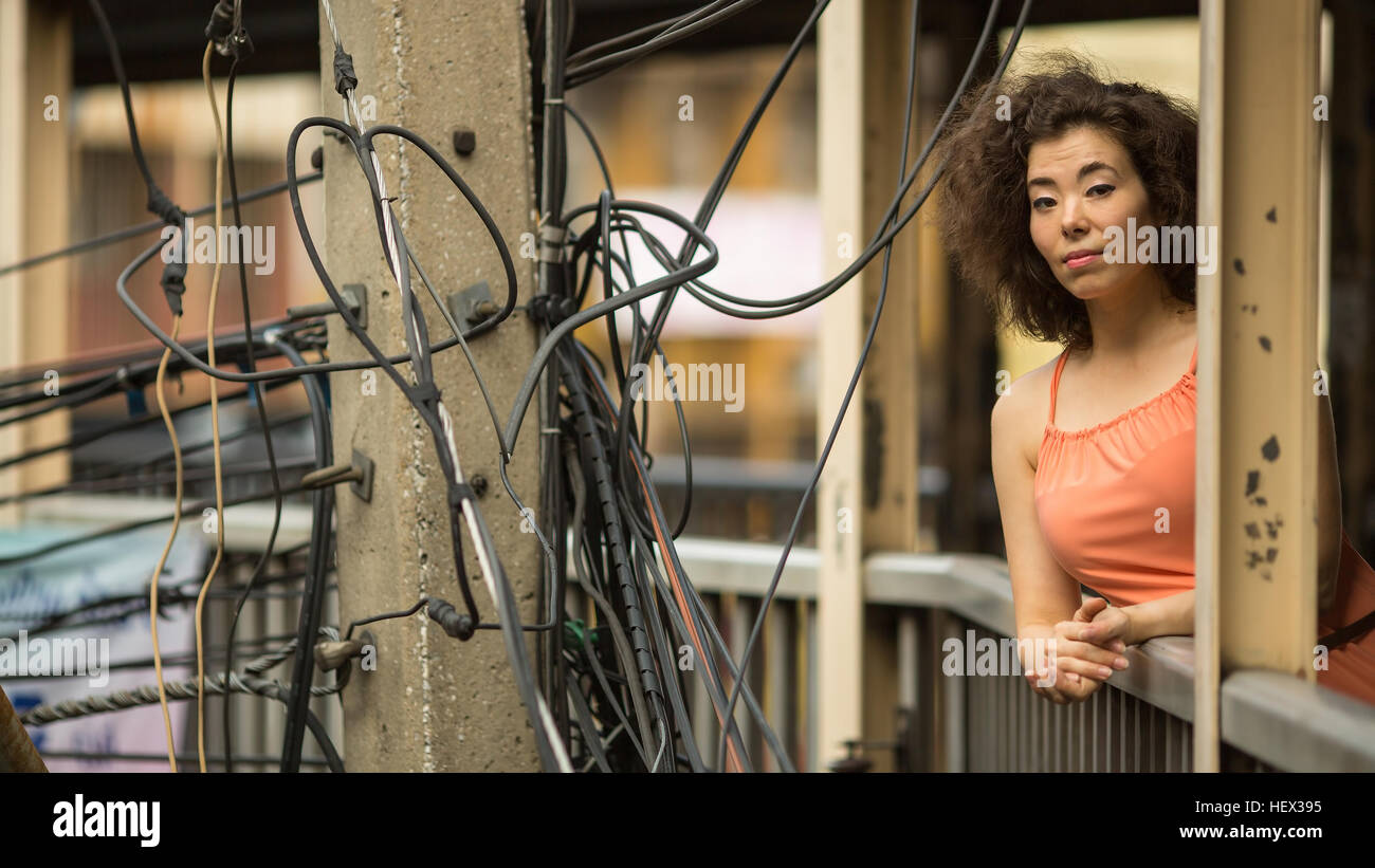Urban portrait of young Asian woman Stock Photo - Alamy