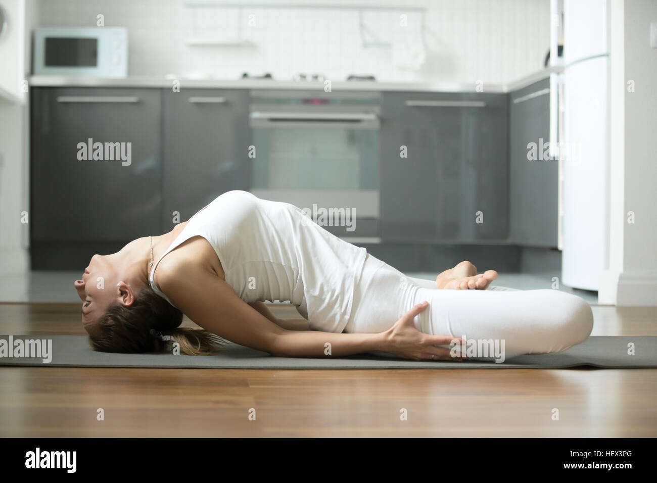 Fish yoga pose Stock Photo - Alamy