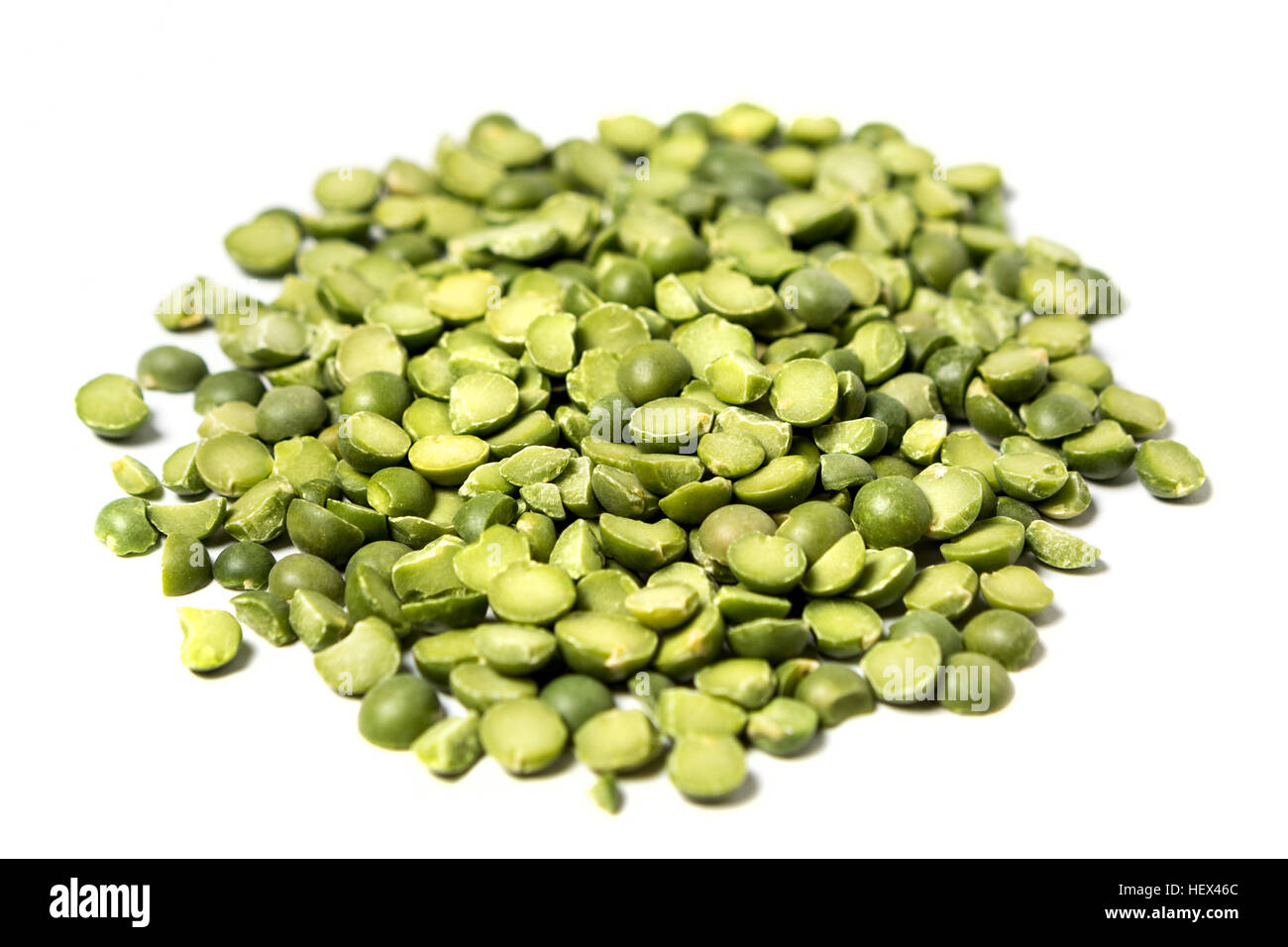 Pile of split peas isolated on white background Stock Photo - Alamy