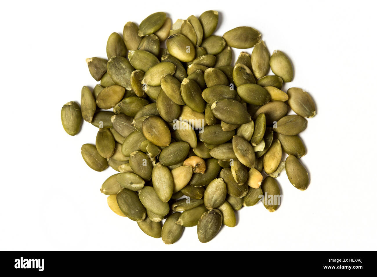 Unshelled pumpkin seeds isolated on white background Stock Photo - Alamy