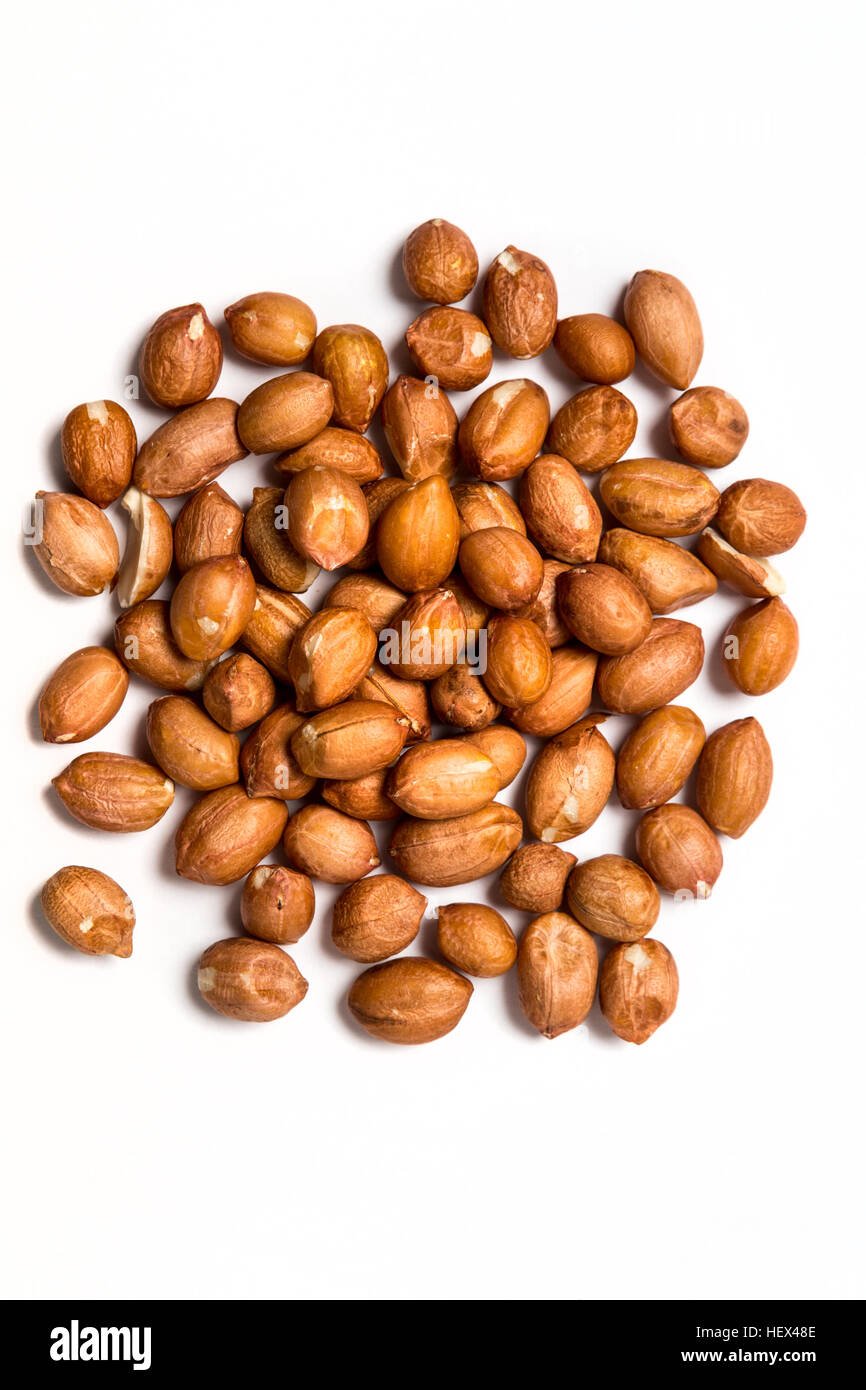Raw spanish peanuts isolated on white background Stock Photo - Alamy