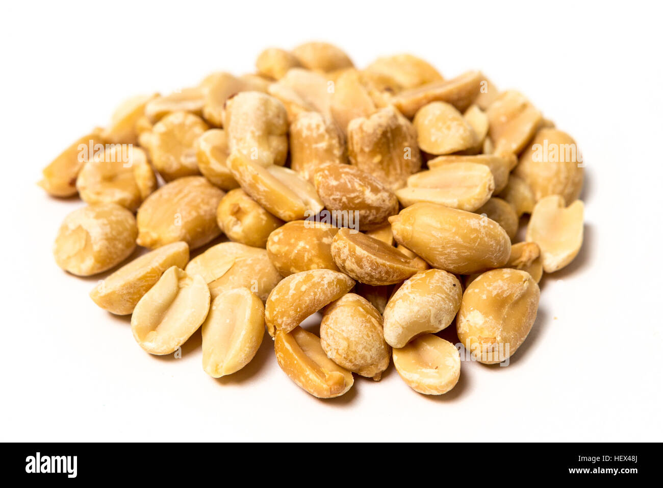 Roasted unsalted peanuts isolated on white background Stock Photo - Alamy