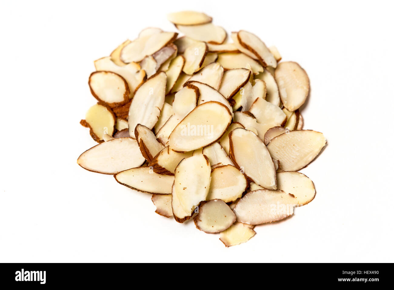 Pile of sliced almonds isolated on white background Stock Photo - Alamy