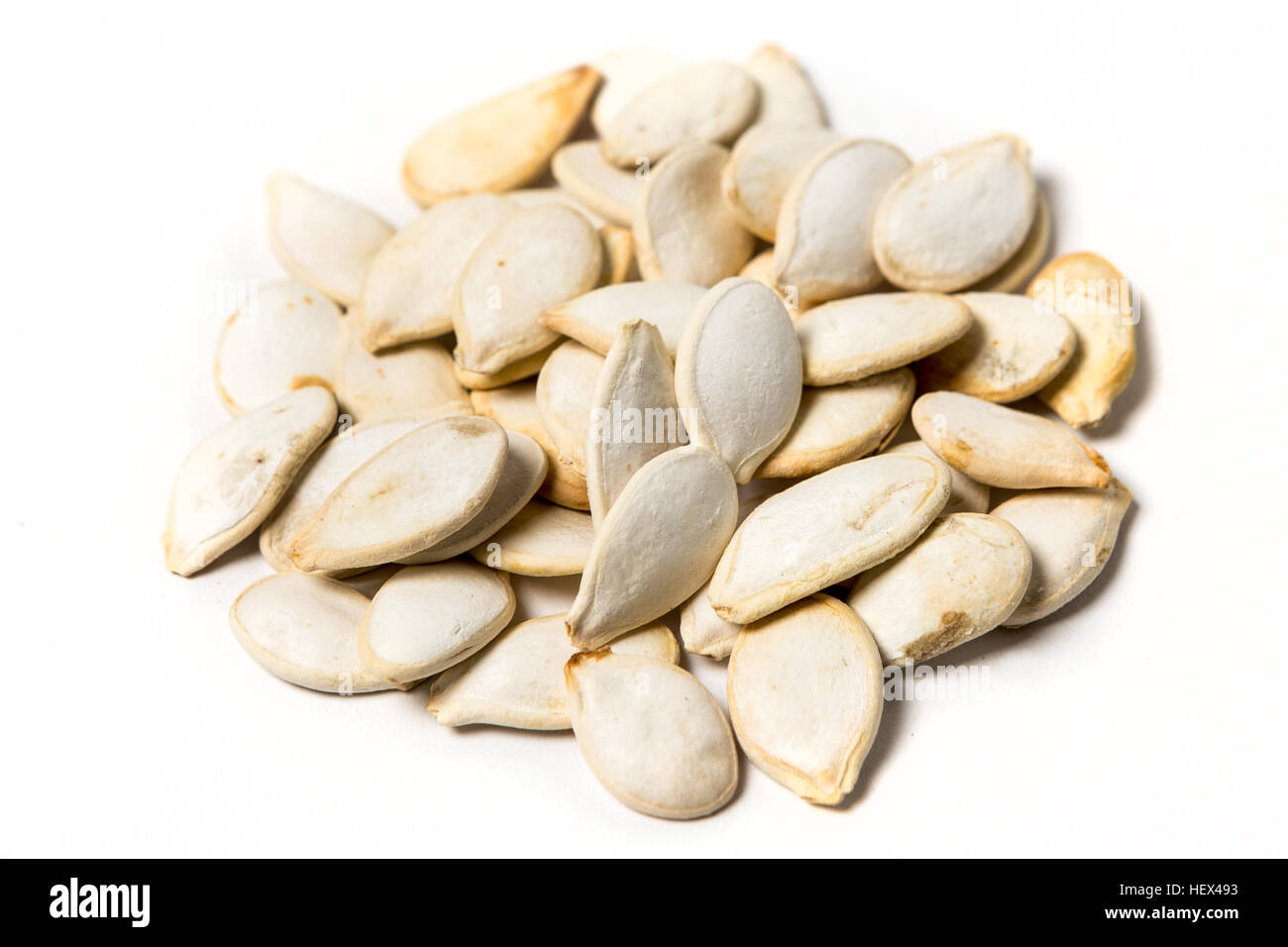 In shell pumpkin seeds isolated on white background Stock Photo - Alamy