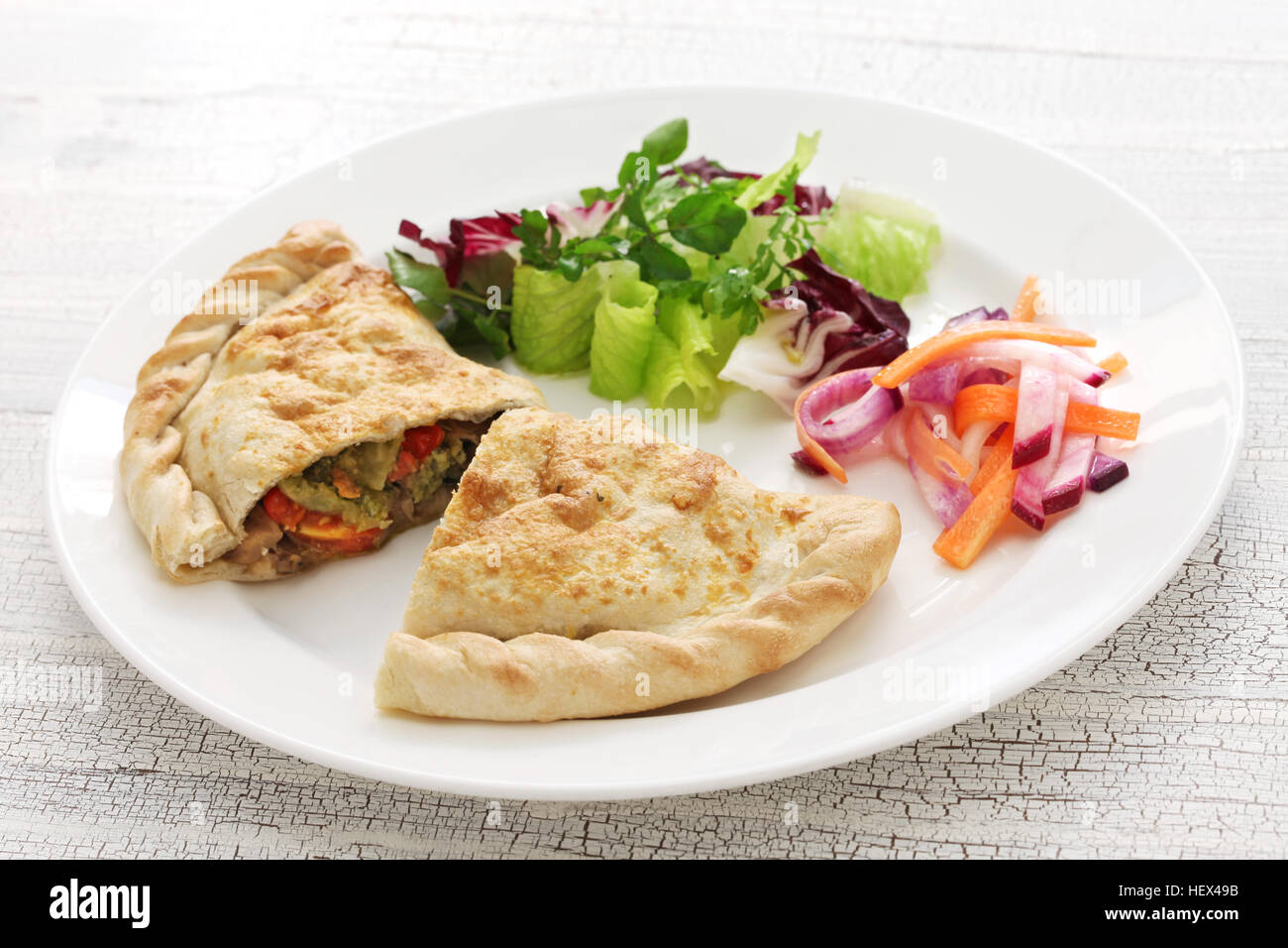 calzone, folded stuffed pizza, italian food Stock Photo - Alamy